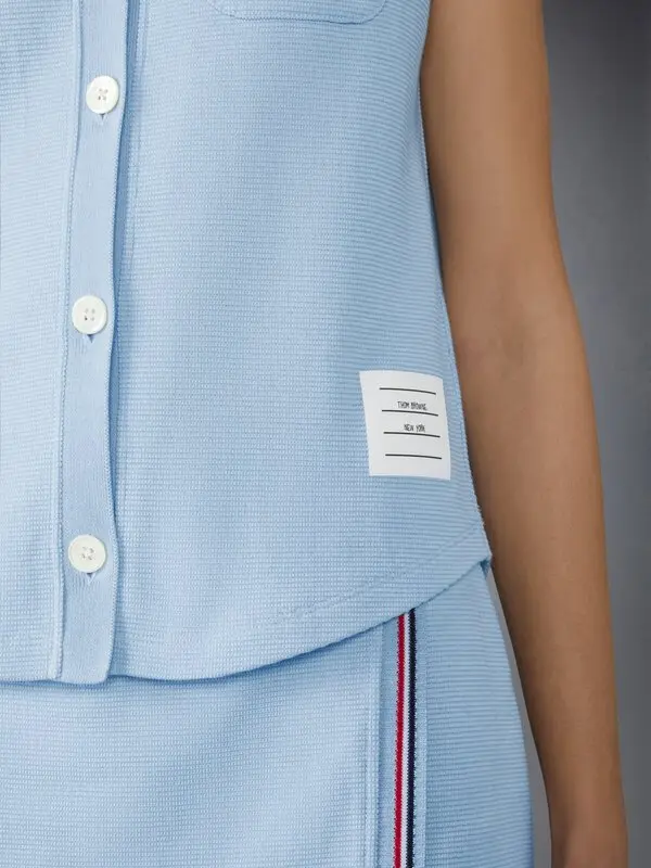 Thom Browne Sleeveless Polo Top With Signature Stripes - Light Blue