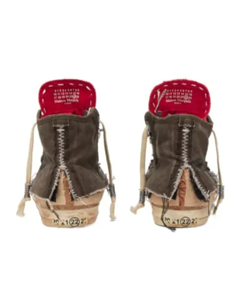 MAISON MARGIELA Distressed High Top Sneakers