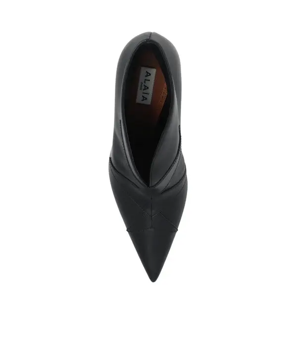 Alaïa Paneled Leather Pointed Toe Ankle Boots