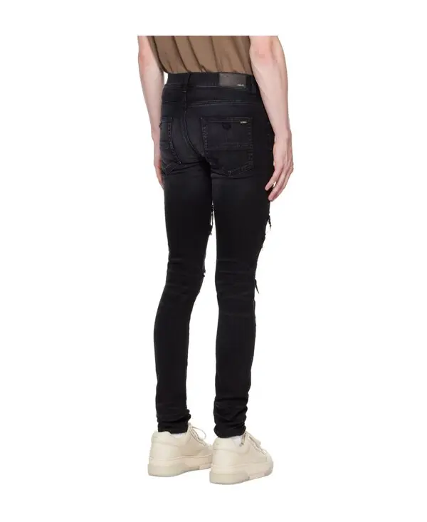 Amiri Distressed Skinny Jeans