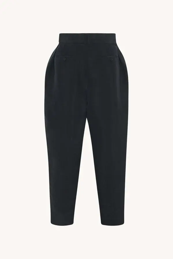 THE ROW Pleated Tapered Leg Silk Trousers