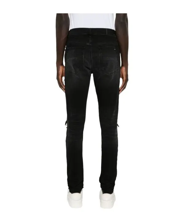 Amiri Mx1 Skinny Jeans With Distressed Details - Black