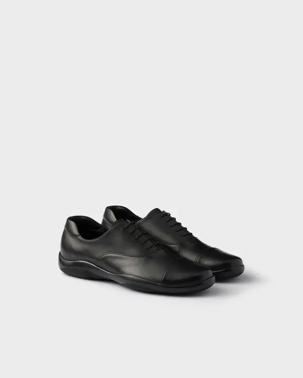 Prada Round Toe Lace-up Sneakers