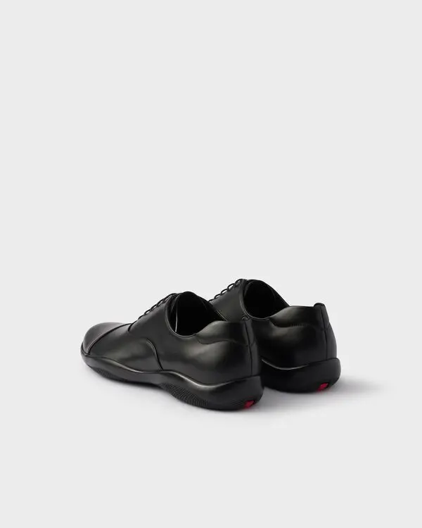 Prada Round Toe Lace-up Sneakers