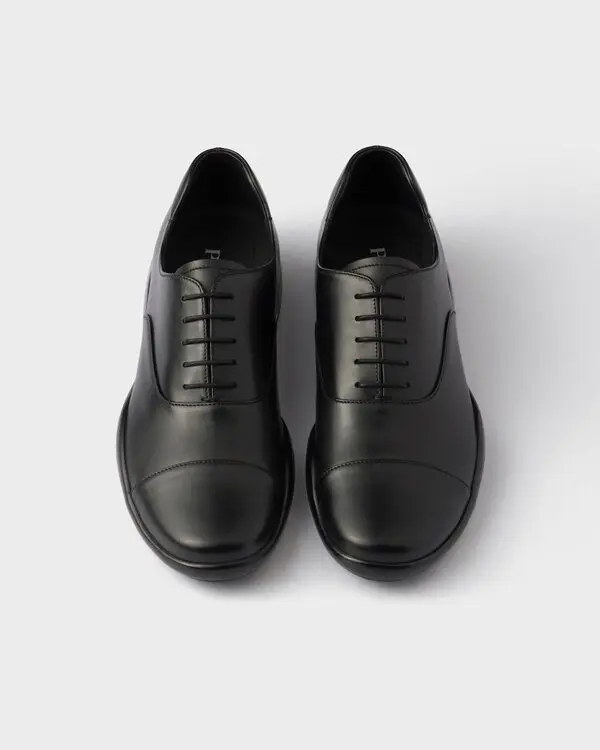 Prada Round Toe Lace-up Sneakers