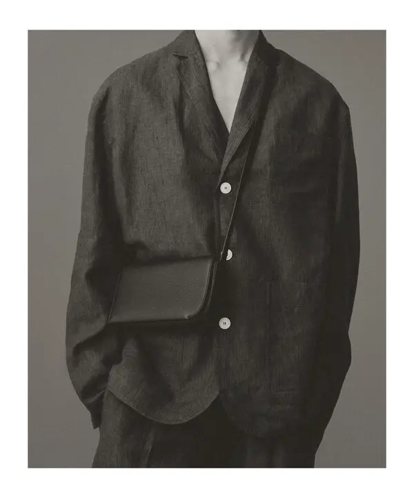 Jacquemus The Curvo Flap Crossbody Bag