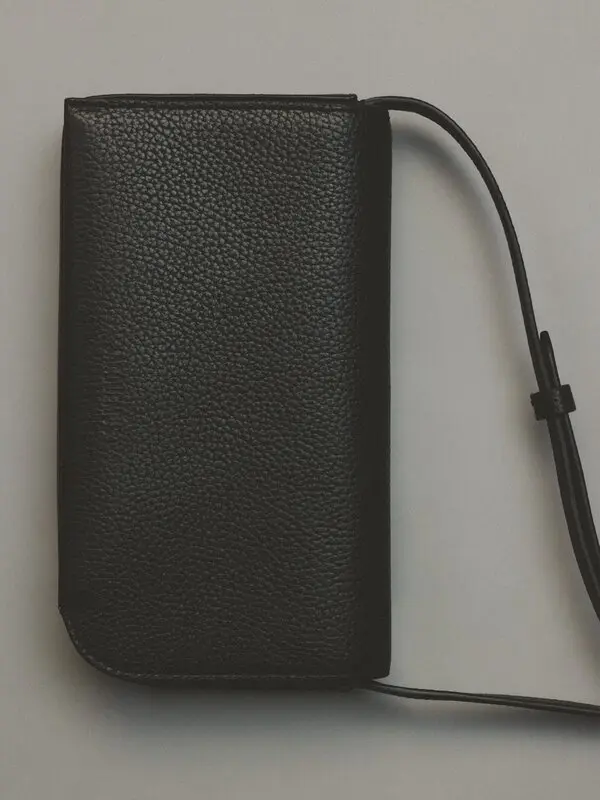 Jacquemus The Curvo Flap Crossbody Bag