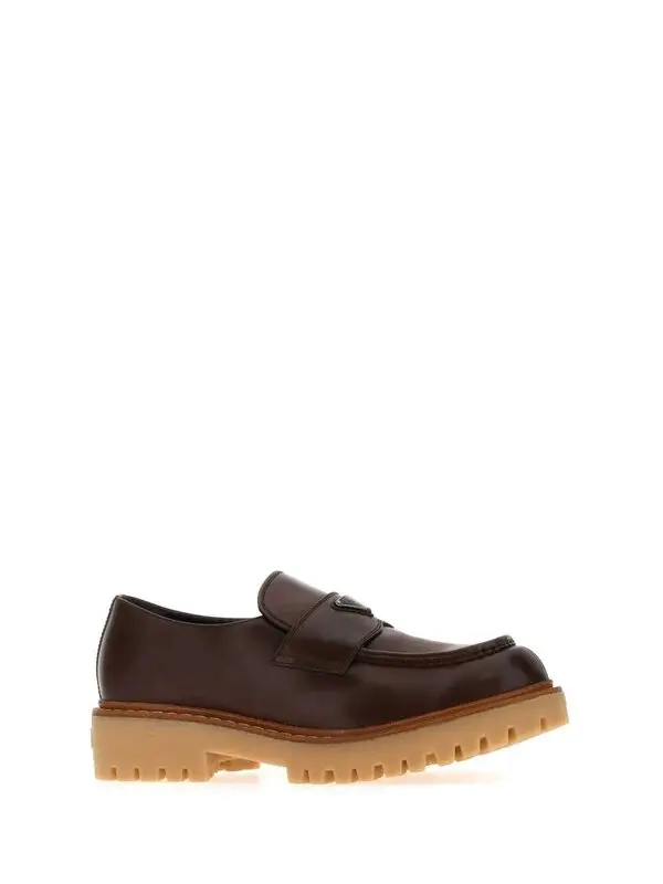 Prada Logo Plaque Round Toe Loafers
