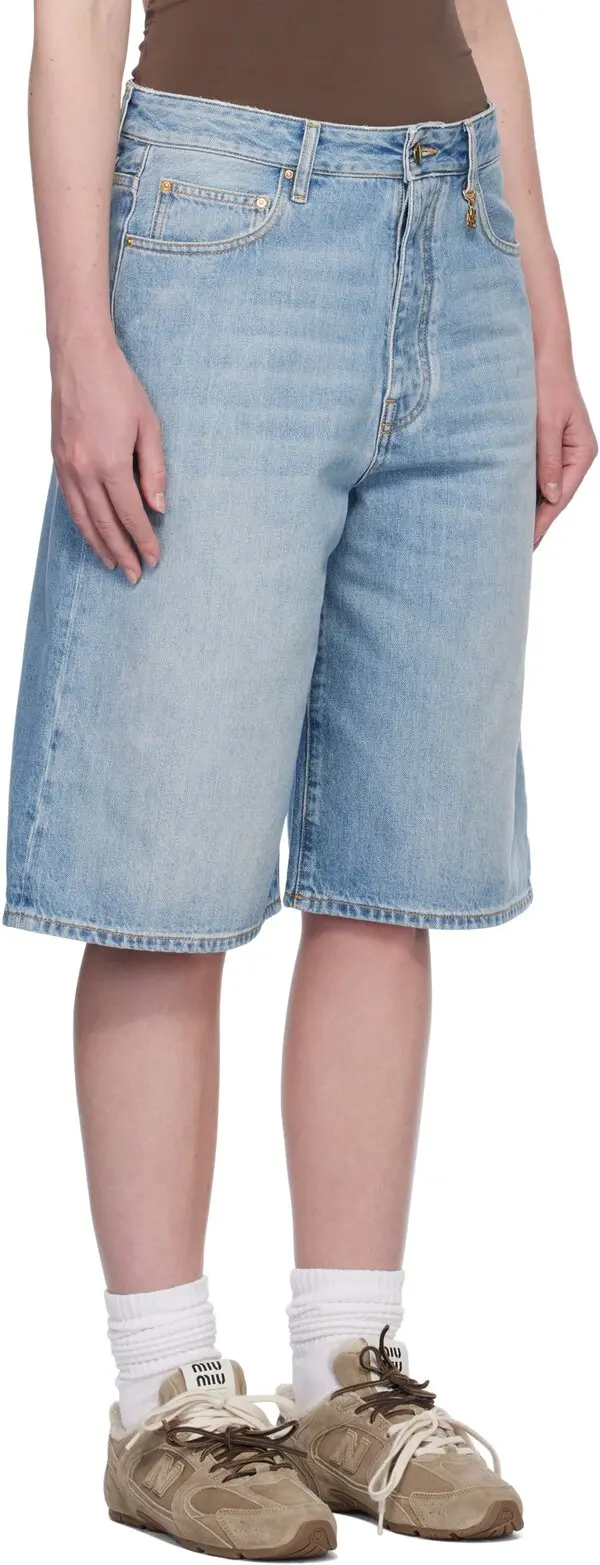 Amiri Light Wash Distressed Denim Shorts