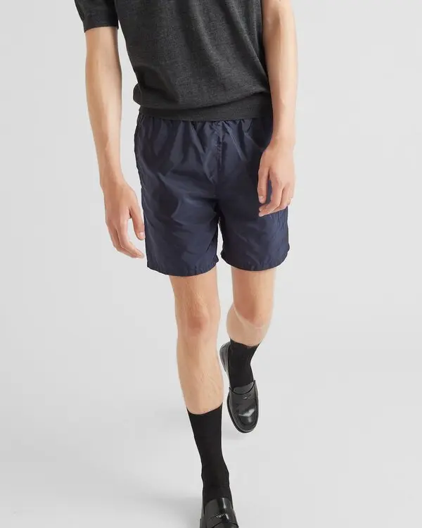 Prada Triangle Logo Plaque Elastic Swim Shorts - Blue
