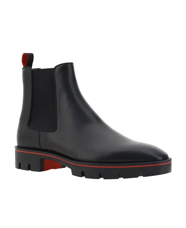 CHRISTIAN LOUBOUTIN Slip-on Ankle Boots With Elastic Sides And Striped Sole