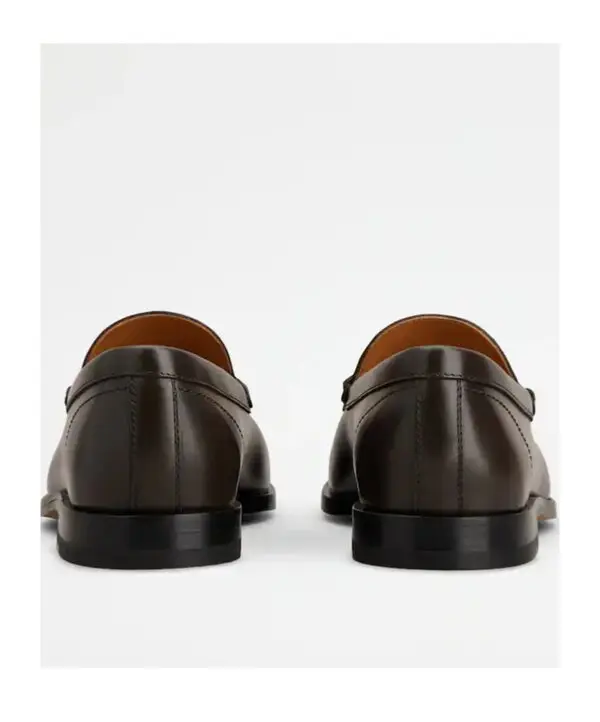 TOD'S Round-toe Calfskin Penny Loafers With Signature Embossing And Hand-stitching - Brown