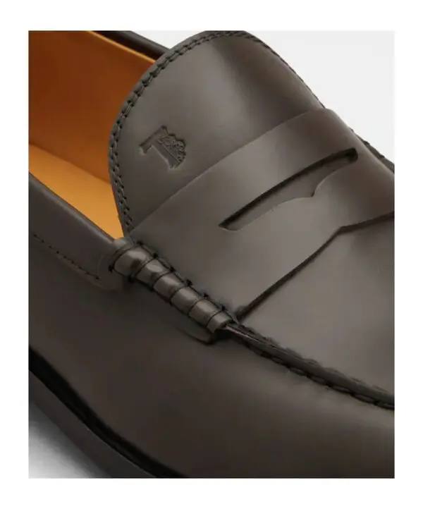 TOD'S Round-toe Calfskin Penny Loafers With Signature Embossing And Hand-stitching - Brown