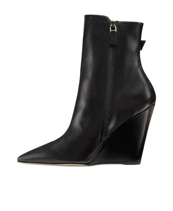 STUART WEITZMAN Pointed Toe Wedge Boots