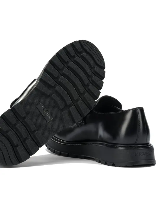 Prada Logo-detailed Slip-on Loafers