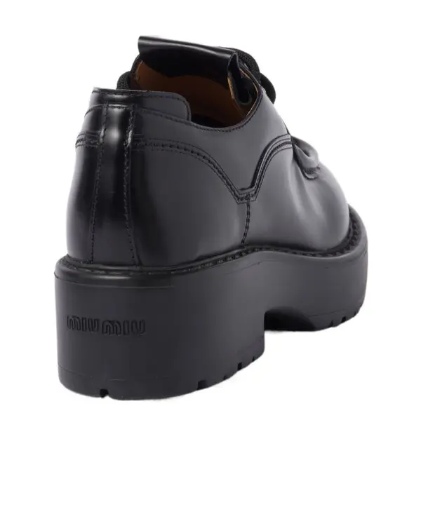 Miu Miu Lace-up Flat Shoes