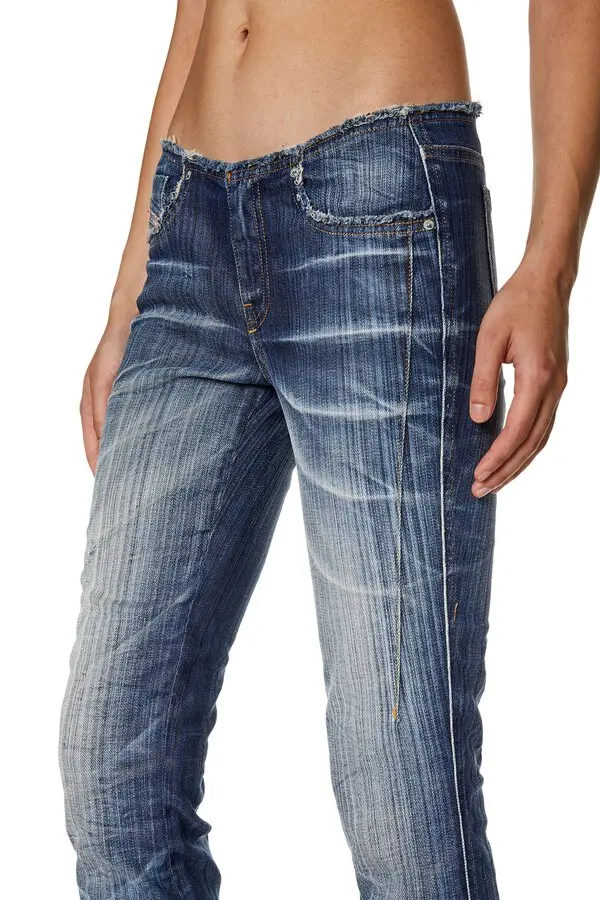 DIESEL® Heeled Low-rise Bootcut Distressed Jeans