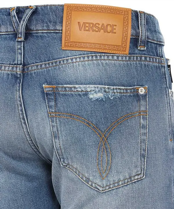 Versace Logo-patch Distressed Denim Jeans