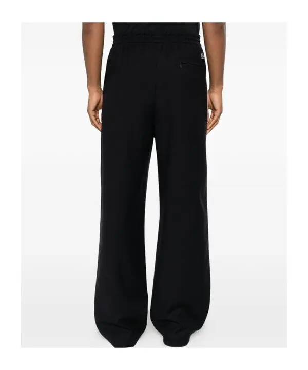 Loewe Drawstring Wool Trousers With Embroidered Rearrangement Pattern - Blue
