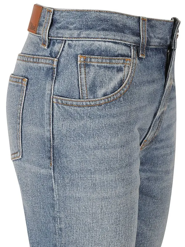 Chloé Flared Jeans With Frayed Hem
