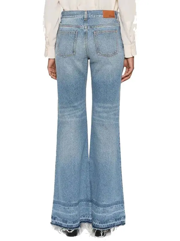 Chloé Flared Jeans With Frayed Hem