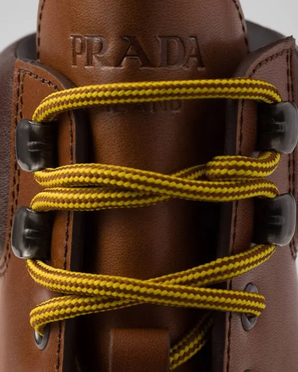Prada Round Toe Lace Up Boots