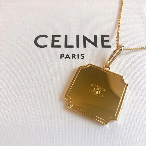 Celine Separables Triomphe Plate Pendant In Brass With Gold Finish