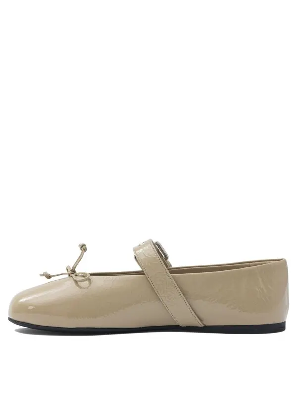 Miu Miu Round Toe Ballet Flats With Buckled Strap And Bow