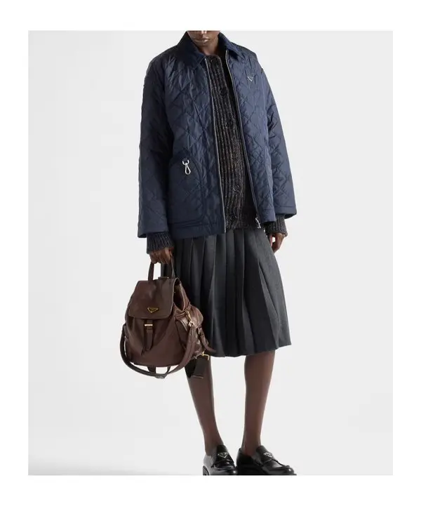 Prada Re-nylon Quilted Jacket With Enamel Triangle Logo - Blue