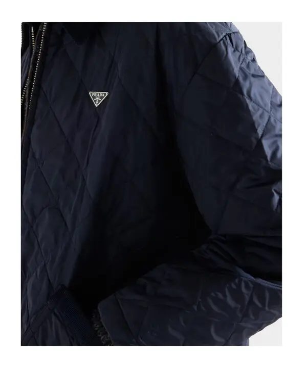 Prada Re-nylon Quilted Jacket With Enamel Triangle Logo - Blue