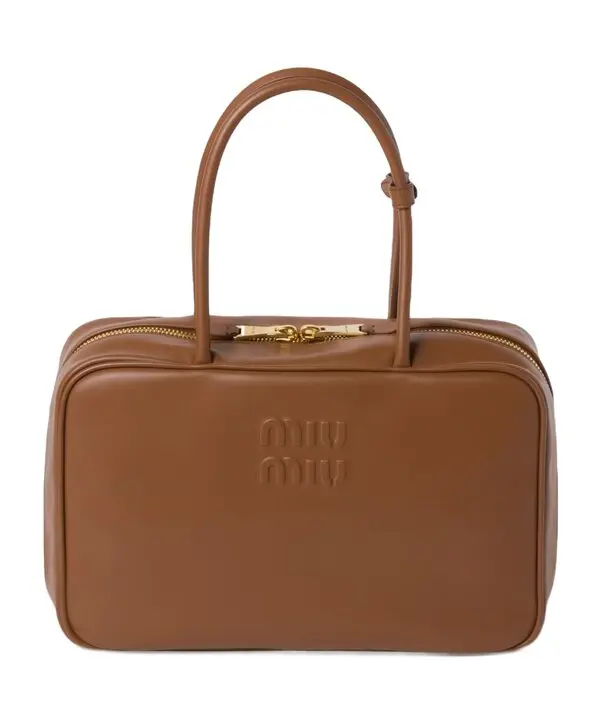 Miu Miu Logo Debossed Zipped Tote Bag - Cognac