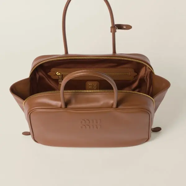 Miu Miu Logo Debossed Zipped Tote Bag - Cognac