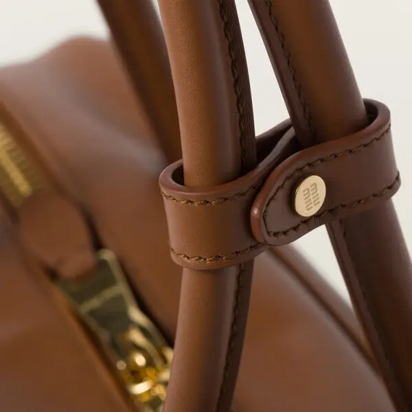 Miu Miu Logo Debossed Zipped Tote Bag - Cognac