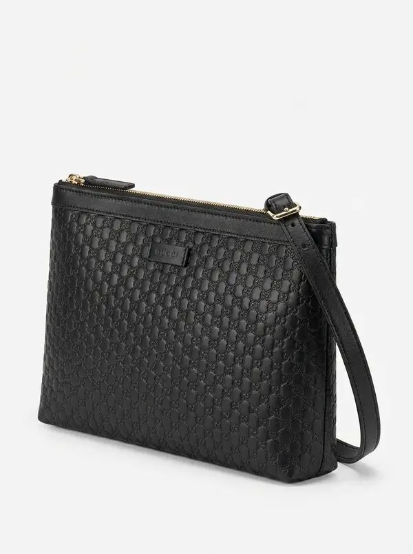 Gucci Embossed Logo Shoulder Bag