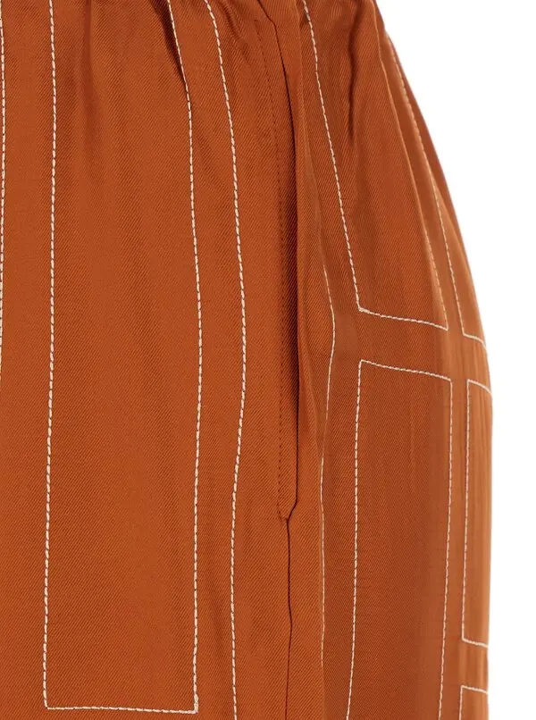 TOTEME Monogram-patterned Wide-leg Trousers