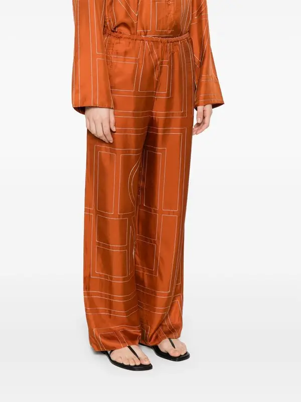 TOTEME Monogram-patterned Wide-leg Trousers