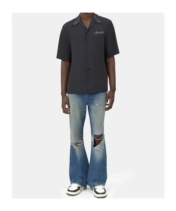Amiri Ripped Knee Bootcut Denim Jeans
