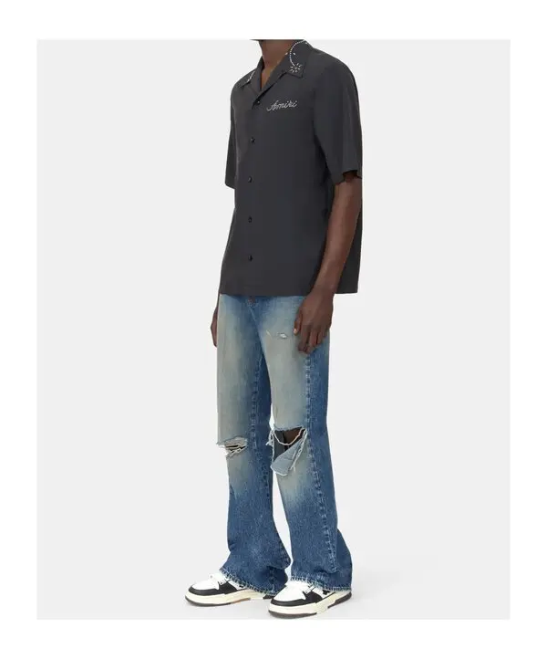 Amiri Ripped Knee Bootcut Denim Jeans
