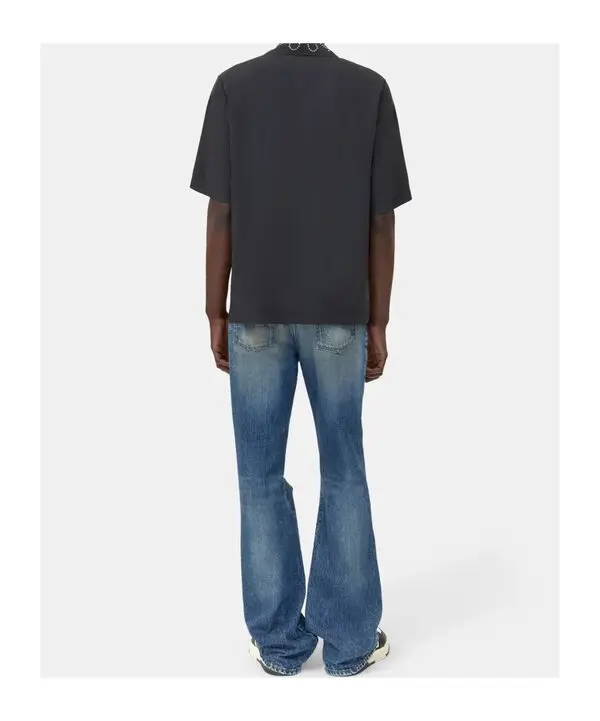 Amiri Ripped Knee Bootcut Denim Jeans