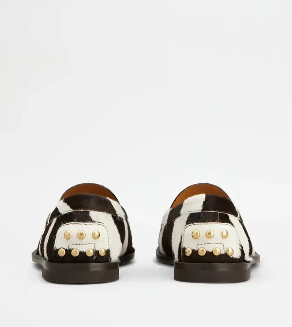 TOD'S Faux Pony Leather Round Toe Loafers With Metal Heel Detailing