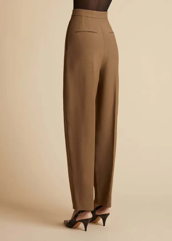 Khaite High-waisted Pleated Ankle-length Trousers - Brown