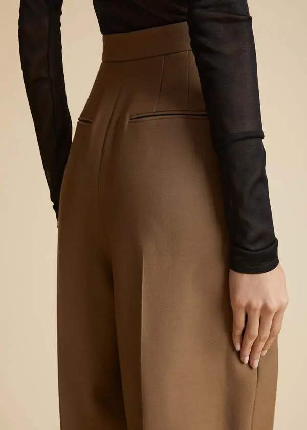 Khaite High-waisted Pleated Ankle-length Trousers - Brown