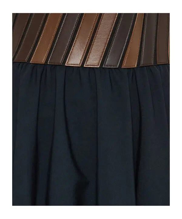 Alaïa Leather Trimmed Midi Skirt