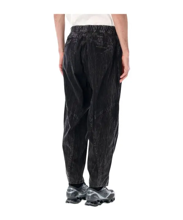AND WANDER Textured Relaxed-fit Pants