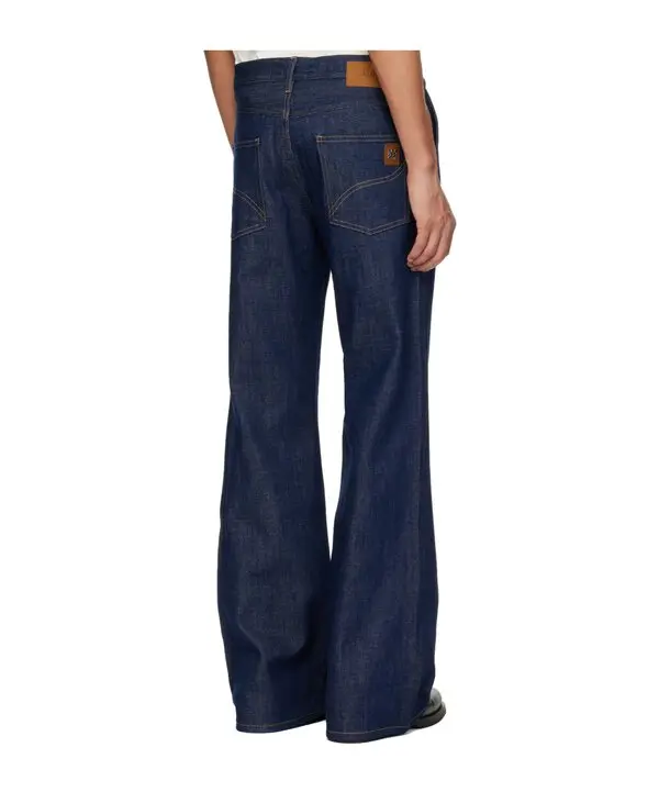 Amiri Raw Boot Cut Jeans