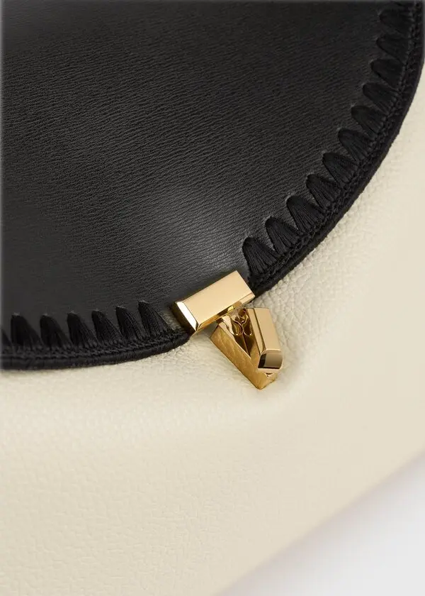 TOTEME T-lock Embroidered Two-toned Shoulder Bag - Black/milk