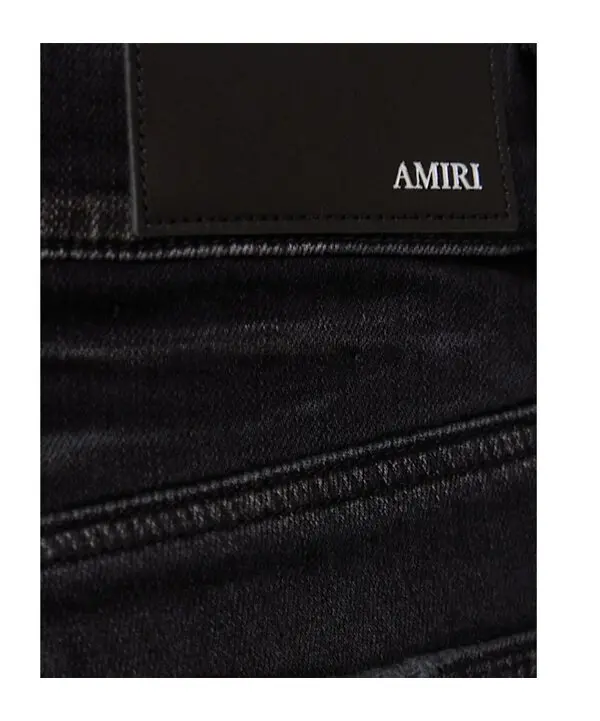 Amiri Skinny Jeans With Embroidery And Distressing