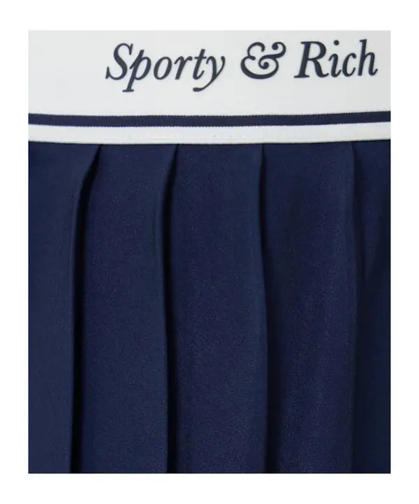 SPORTY  RICH Sporty & Rich Pleated Logo Mini Skirt