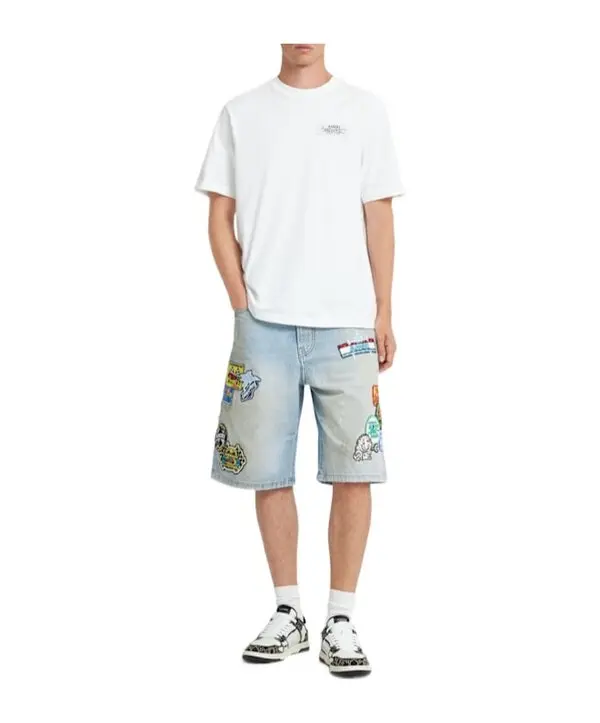 Amiri Patchwork Distressed Denim Shorts