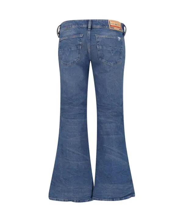 DIESEL® Flared Distressed Jeans